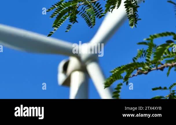 Wind power station. Wind turbine in operation. Green alternative energy ...