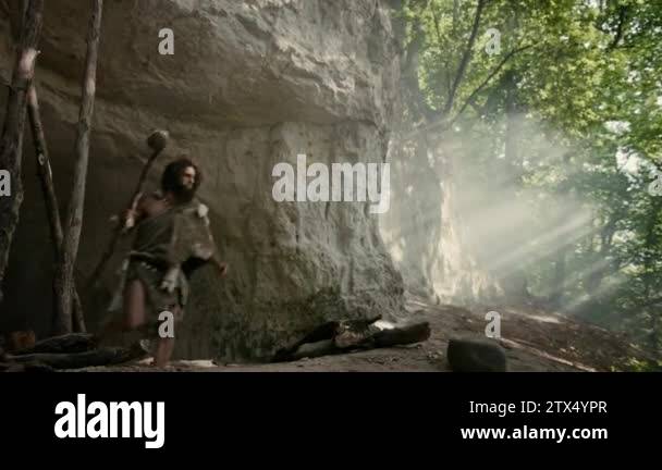 Primeval Caveman Wearing Animal Skin Holds Stone Tipped Hammer Looks ...