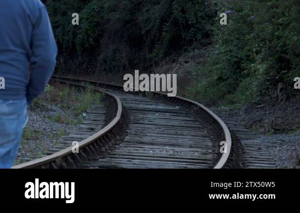 Man walking on train tracks Stock Videos & Footage - HD and 4K Video ...