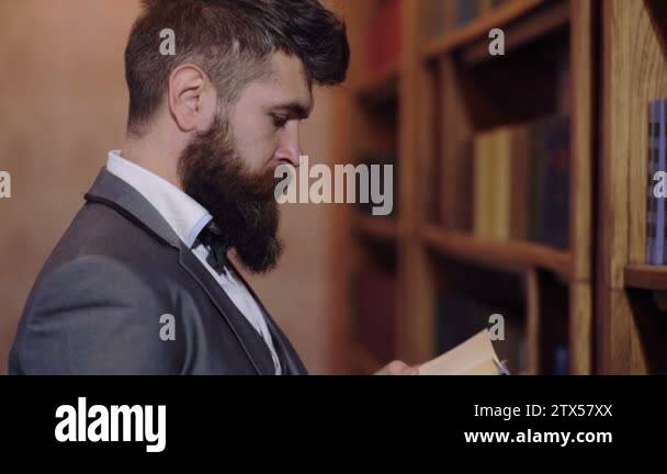 Gentleman standing reading book Stock Videos & Footage - HD and 4K ...