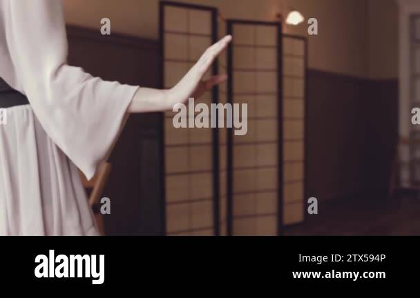 Ballet dance. Ballerina in a simple elegant elegant dress and ...