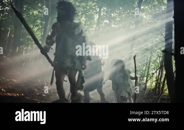 Tribe of Hunter-Gatherers Wearing Animal Skin Holding Stone Tipped ...