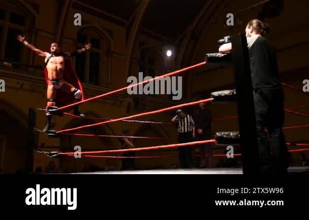 Caped Superhero Wrestler Posing in Corner of Wrestling Ring Stock Video ...