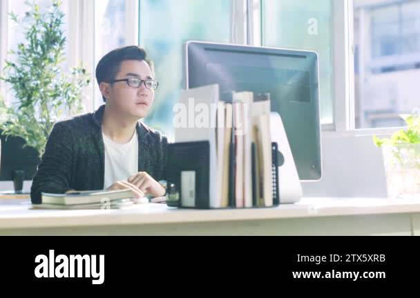 One asian man computer desk Stock Videos & Footage - HD and 4K Video ...