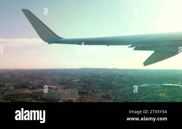 Airplane flight. View through the window of an airplane of the wing and ...