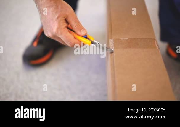 Man unpacking cardboard box Stock Videos & Footage - HD and 4K Video ...