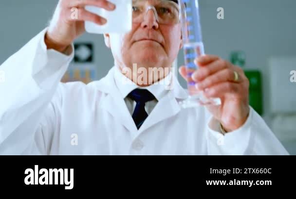 Attentive male scientist experimenting in laboratory 4k Stock Video ...