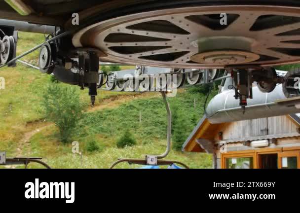 Elevator mechanism. Motor rotating chair lift to the mountain Stock ...