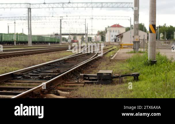 Inspector inspects checks the automatic switch mechanism on the railway ...