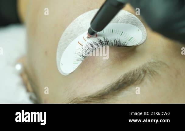 Beauty salon procedure marking eyes in the process of eyelash ...