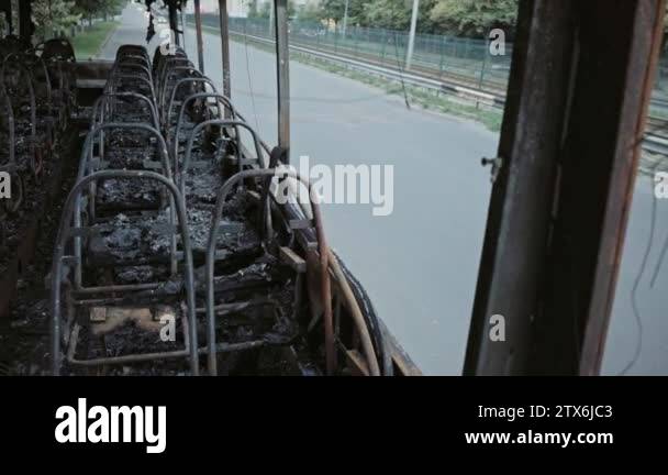 Bus after the fire. Explosion of a bomb in a passenger vehicle. The ...