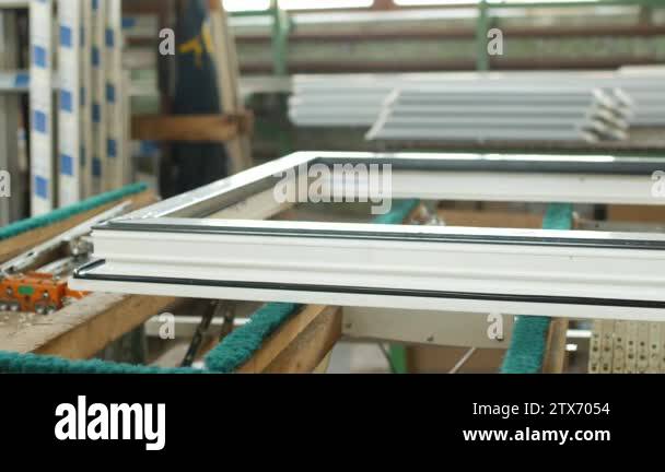 Production and manufacturing of plastic windows pvc, on the table lies ...