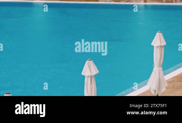 Bad weather during vacation at the pool of a beautiful resort Stock ...