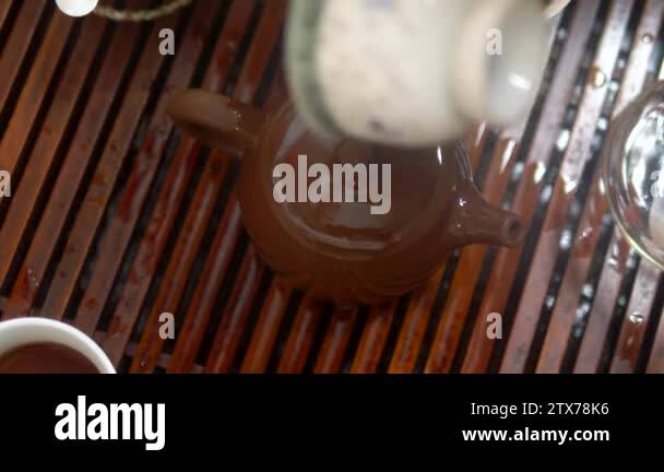 Traditional chinese tea ceremony. the process of draining the first ...