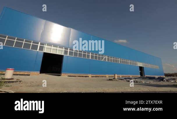 Construction of a modern factory or warehouse. The building of a large ...