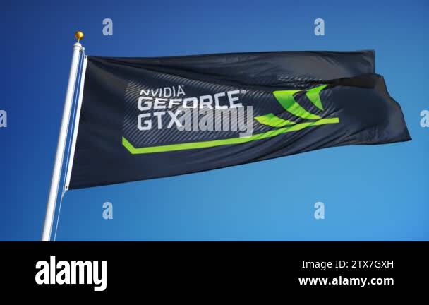 Nvidia GeForce GTX logo flag waving in slow motion against blue sky ...