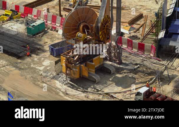 deep excavator digging holes for the foundation of skyscraper skis on ...