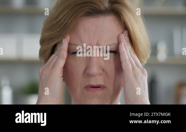 Headache, Tense Old Senior Woman Face Stock Video Footage - Alamy