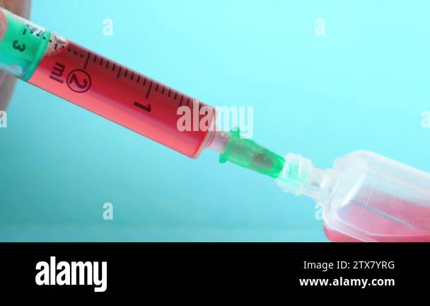 Plastic medical syringe with needle and plastic vial. Medical injection ...