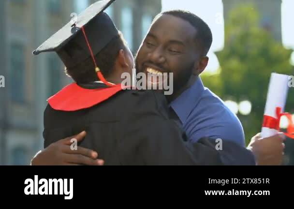 Father graduate son hugging in Stock Videos & Footage - HD and 4K Video ...