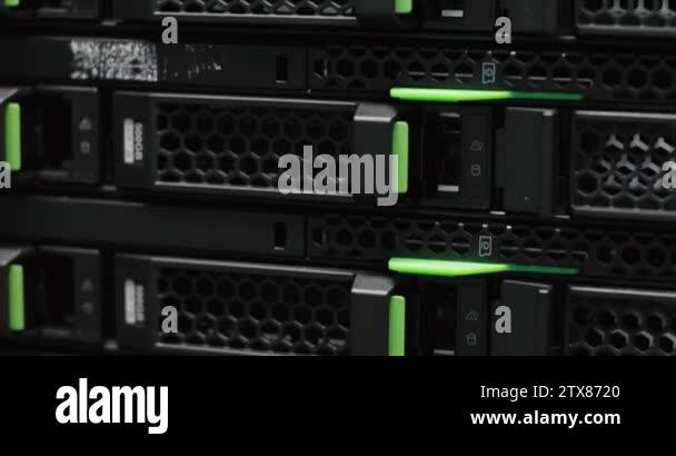 Server rack cluster in a data center. Supercomputer. Network servers in ...