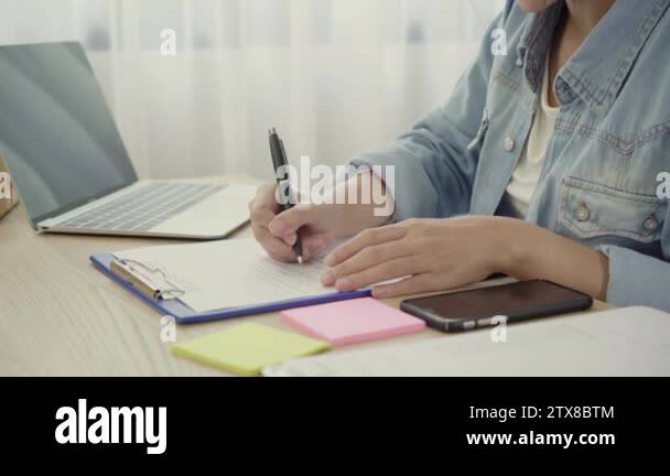 Beautiful smart Asian young entrepreneur business woman owner of SME ...