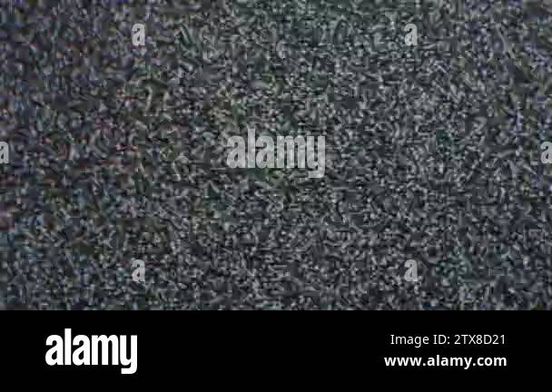 Skull on tv static noise Stock Video Footage - Alamy
