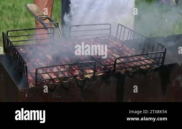 Open air barbecue Stock Videos & Footage - HD and 4K Video Clips - Alamy