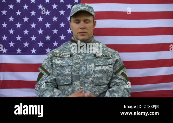 Enlisted male joining hands, praying for peace, american armed forces ...