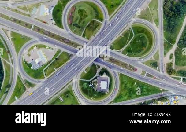 Static vertical top down aerial view of traffic on freeway interchange ...