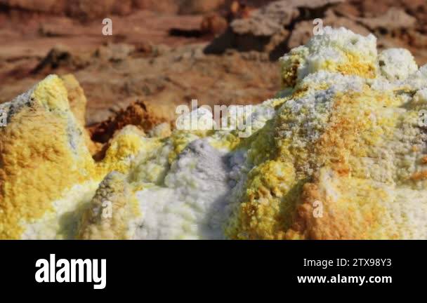 close-up footage of volcanic sulfur rocks, volcanic depression of ...