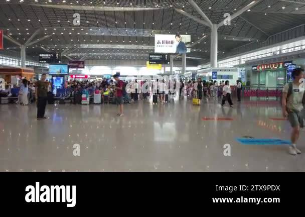 Xian, China - July 2019 : Crowds of Chinese people inside Xian modern high speed rail train ...