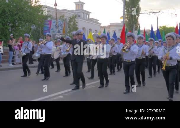 parade of sailors, young men dressed in uniform play musical ...