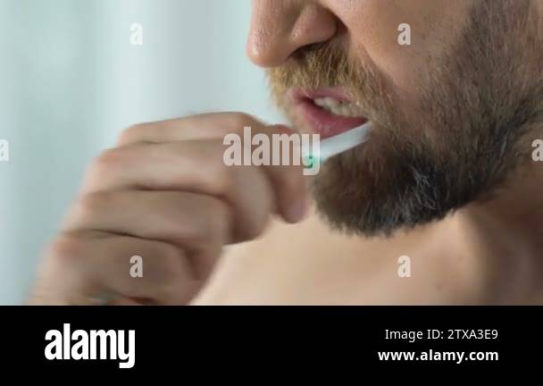 Dentist patient has bleeding gum while brushing teeth, hypersensitivity ...