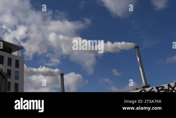 Steam of Water coming out of the Chimney of an Incinerator, Near Paris ...