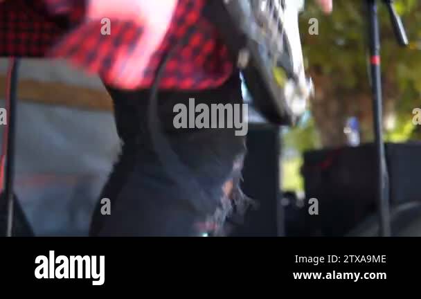 Guitars in live action at a concert. Concert rock band performing on ...