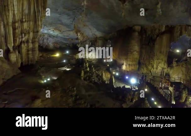 motion along magnificent stalactite and stalagmite structures of huge ...