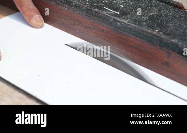 Carpenter at work. Old Chinese carpenter and wood worker cutting ...