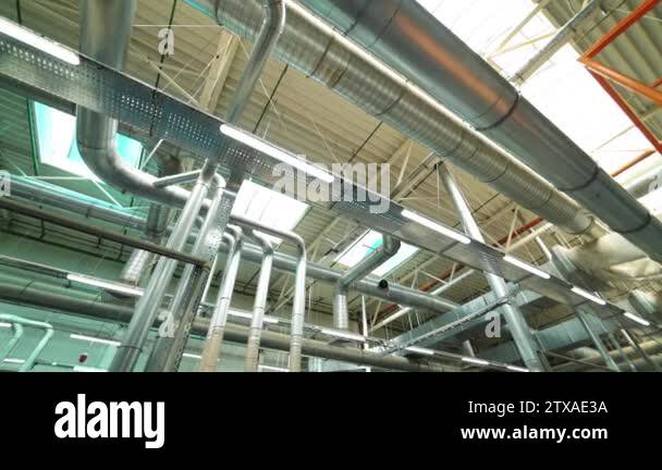 Industrial factory ceiling with ventilation system and lights ...
