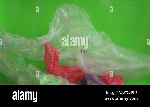 A growing pile of household recyclable garbage: plastic, paper, metal ...