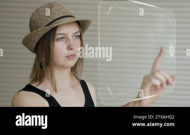 Young girl press on futuristic user interface concept screen. Graphical ...