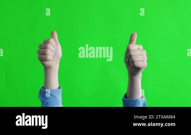 Thumbs up sign hand gesture on green screen. Simbol of approval like ...