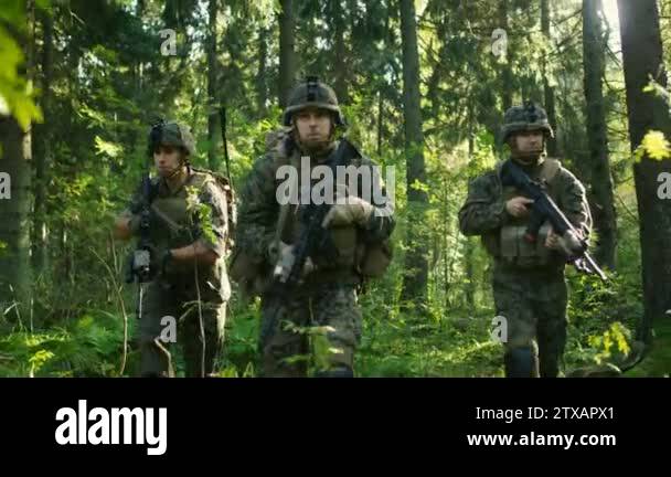 Fully Equipped Soldiers Wearing Camouflage Uniform Attacking Enemy ...