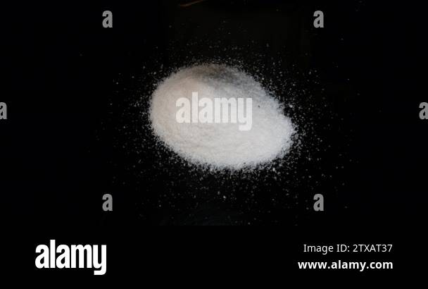 Coconut, cocos nucifera, Fruit and Powder Exploding against Black ...