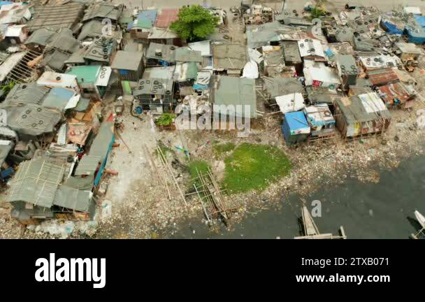 Slums in Manila, a top view. Sea pollution by household waste Stock ...