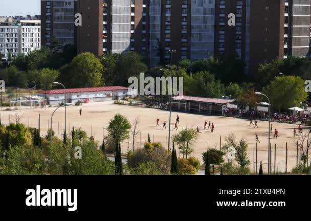 High perspective view of unidentifiable teenagers on a 11 a side ...