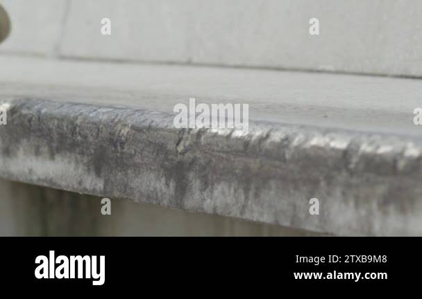 SLOW MOTION EXTREME CLOSE UP DOF: Unrecognizable skateboarder sliding ...