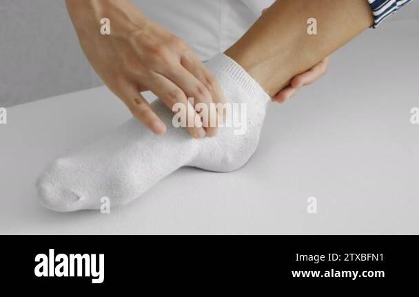 Physician examining patient sprained leg, first aid in trauma clinic ...