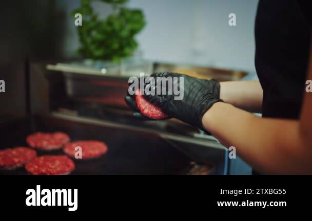 Tasty Close Up Footage of a Meat Patty Being Prepared on a Griller ...