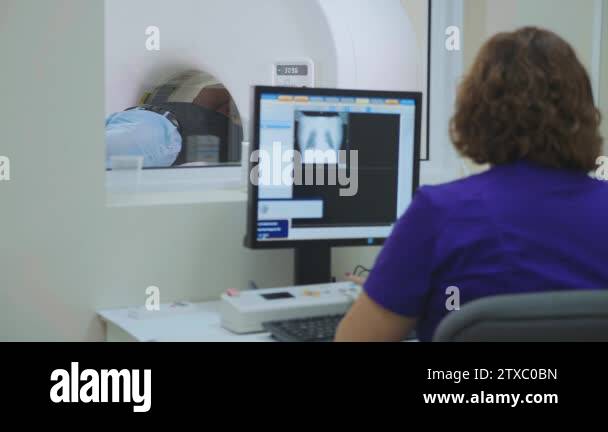 Elderly patient is scanned by MRI, CT scanner at modern hospital Stock ...